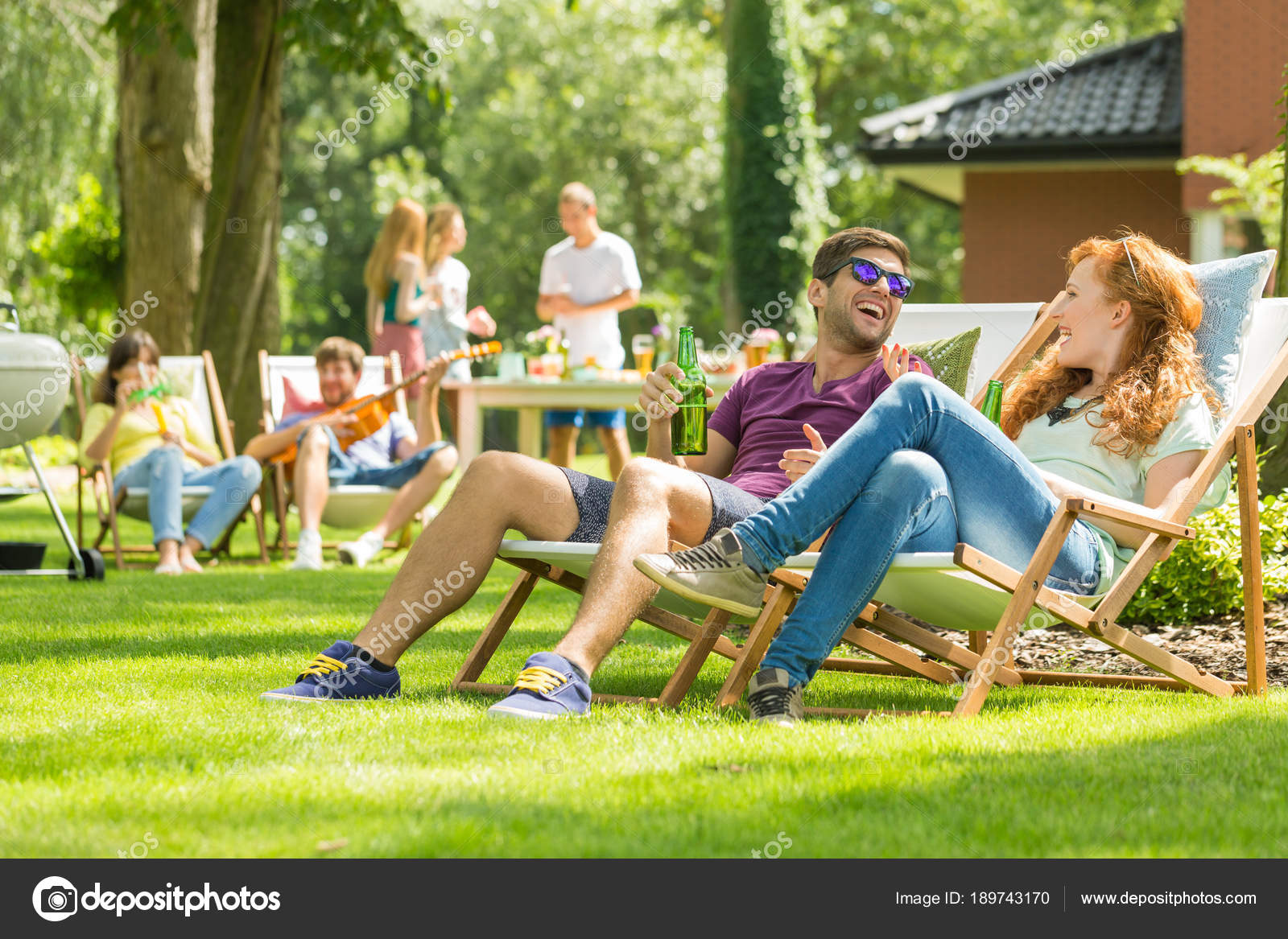 Having fun at backyard party Stock Photo by ©photographee.eu 189743170