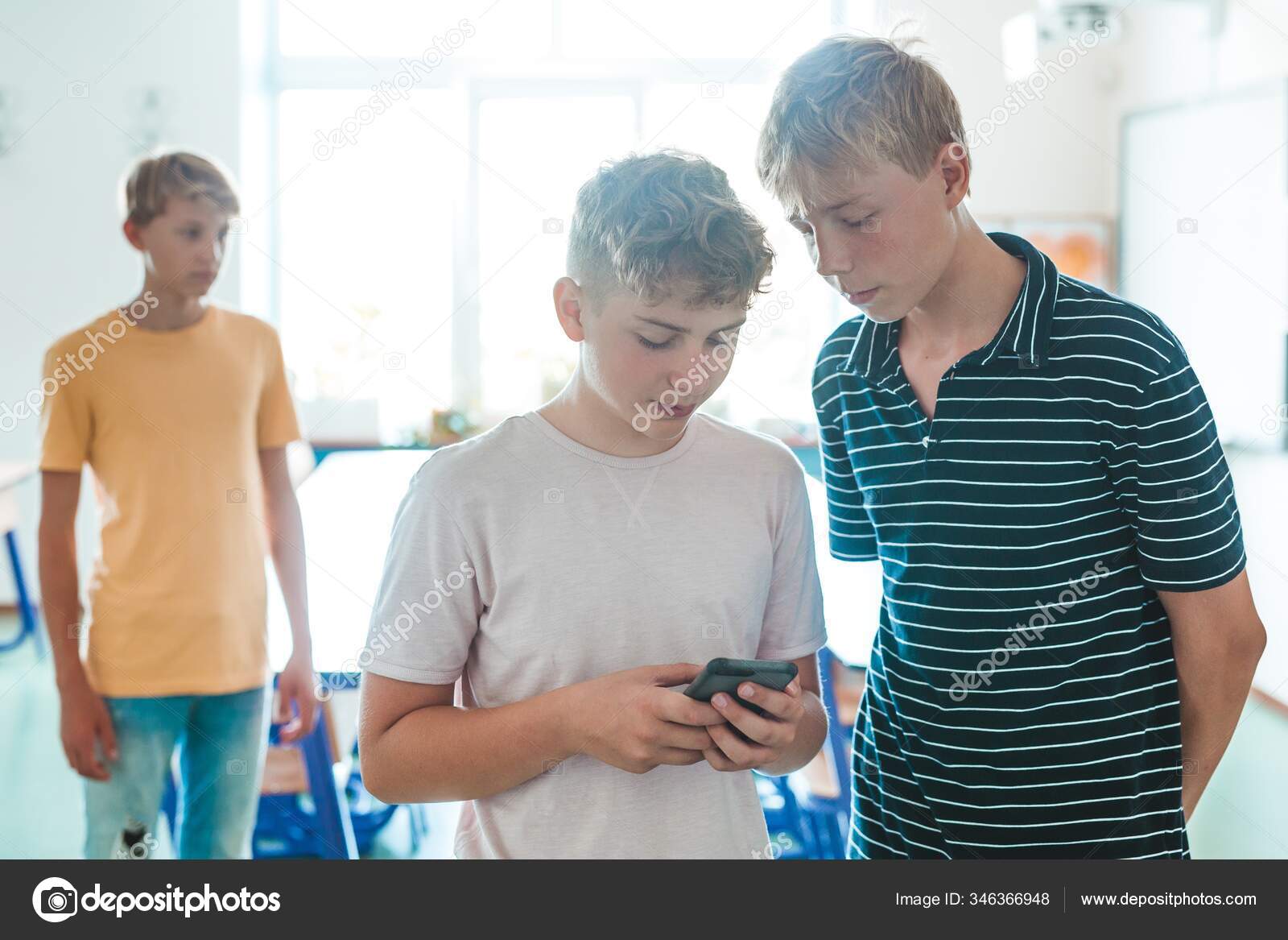 Two Teenage Boys Checking Something Mobile Phone School — Stock Photo ...