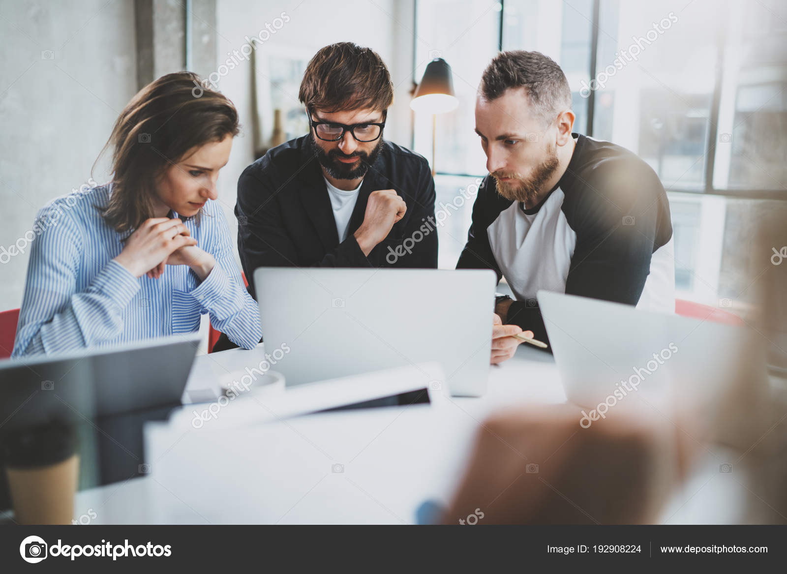 Brainstorming process at sunny office.Coworkers work together modern ...