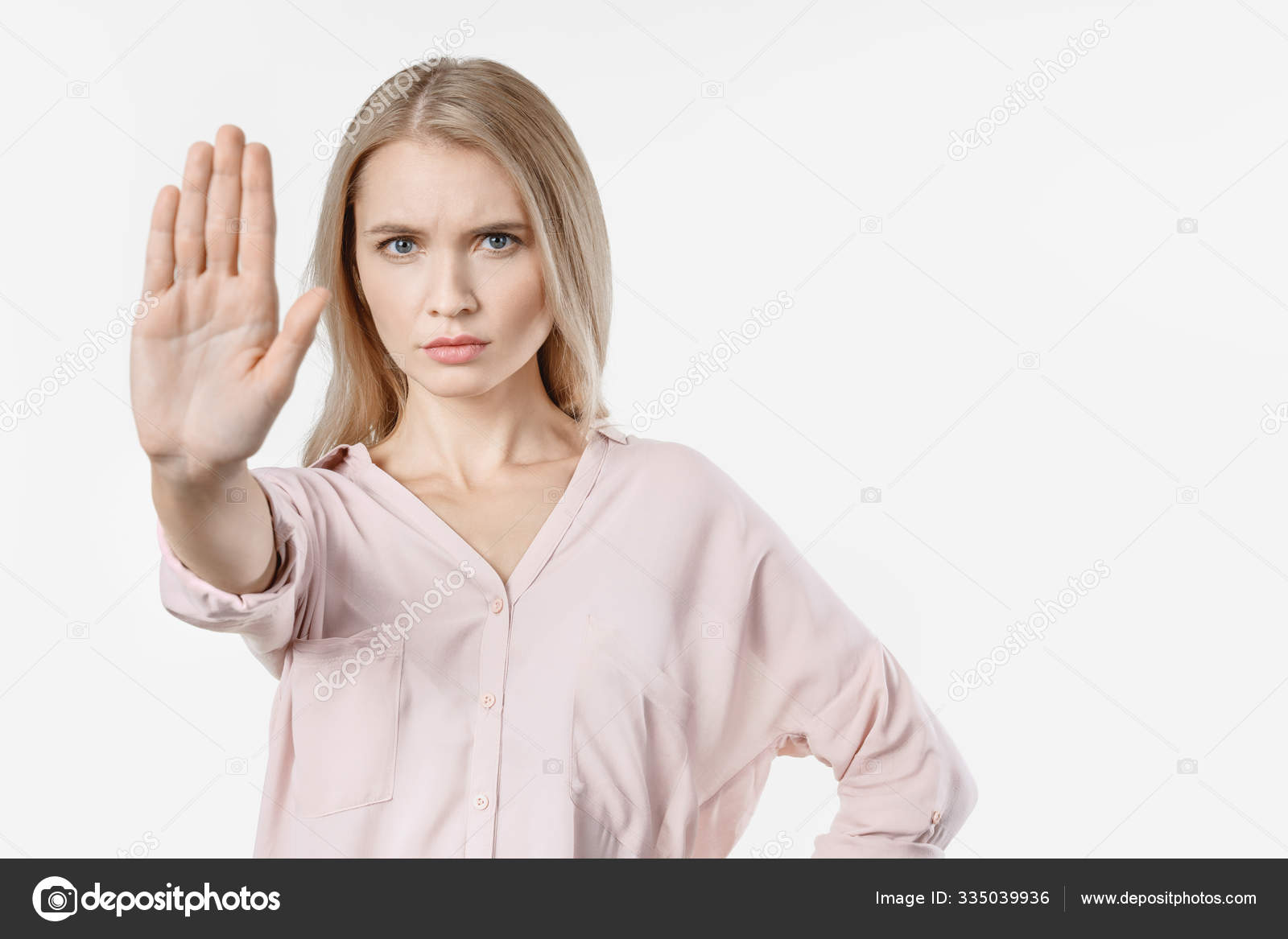 Angry woman gesturing stop sign over isolated white background — Stock ...