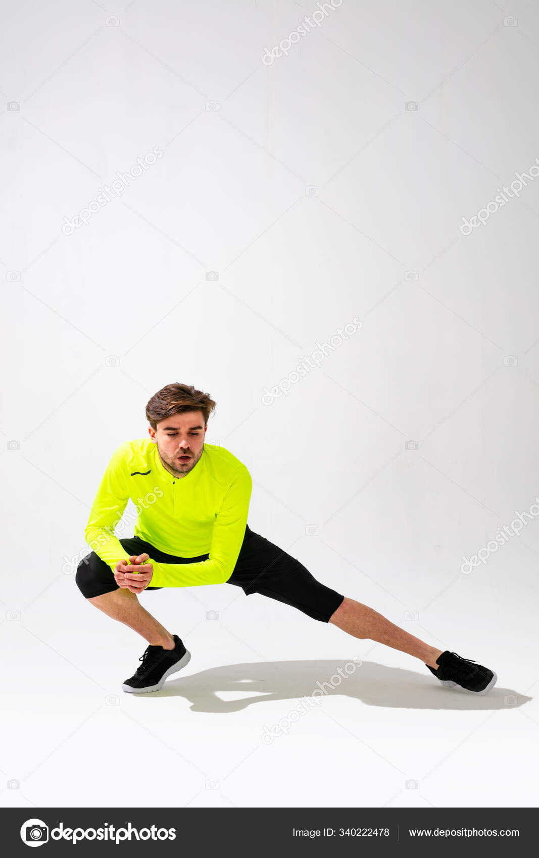 Doing Stretching First Young Man Sportwear Training Stretching His ...
