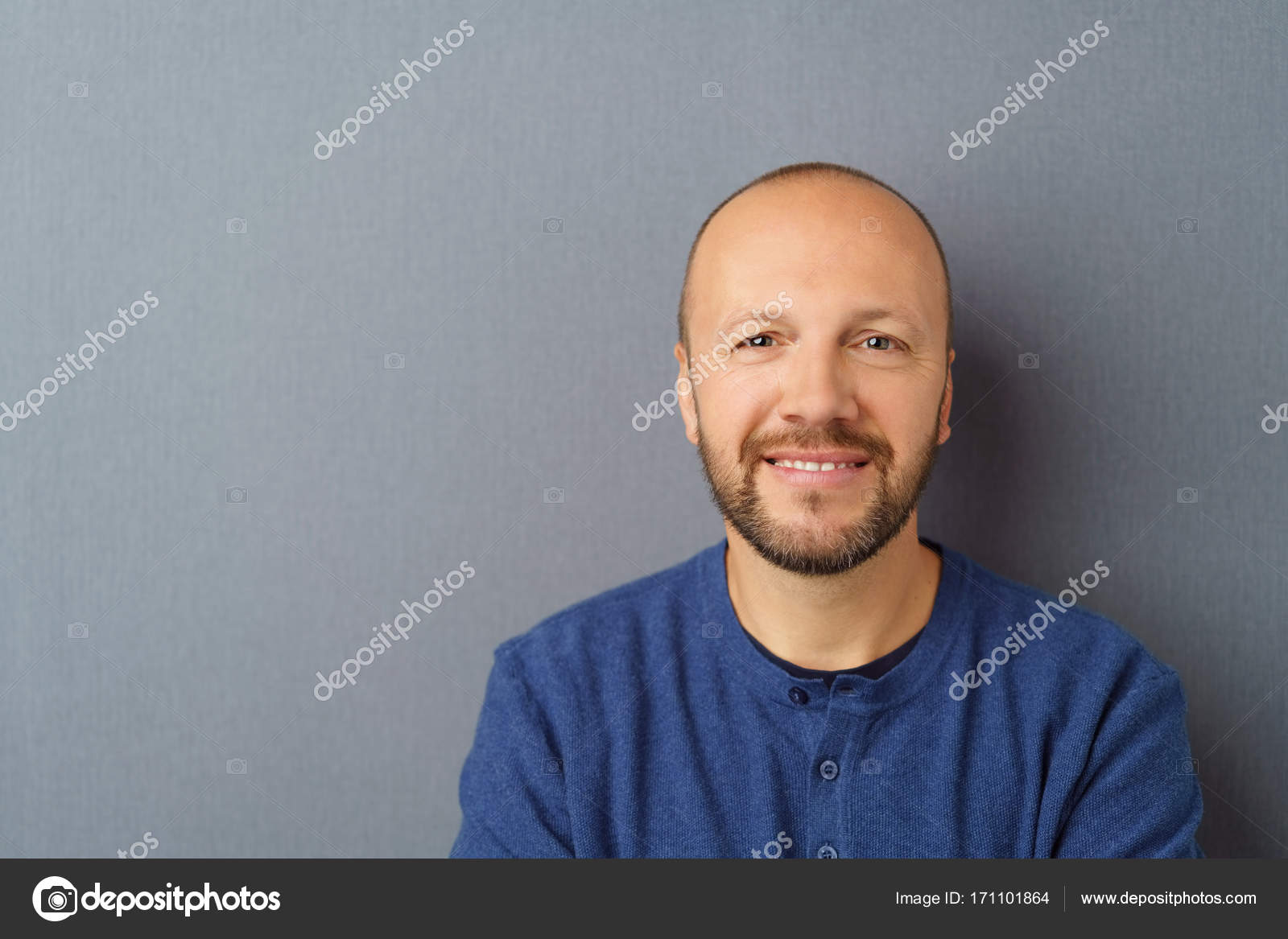 Smiling friendly middle-aged man Stock Photo by ©racorn 171101864