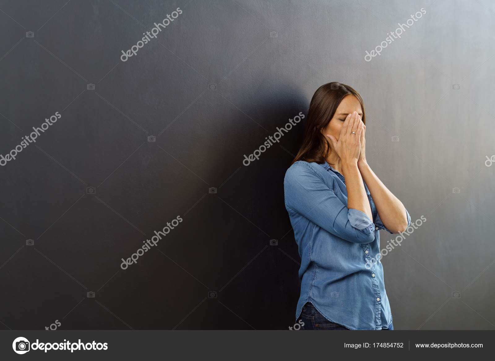 Abashed woman covering her face Stock Photo by ©racorn 174854752