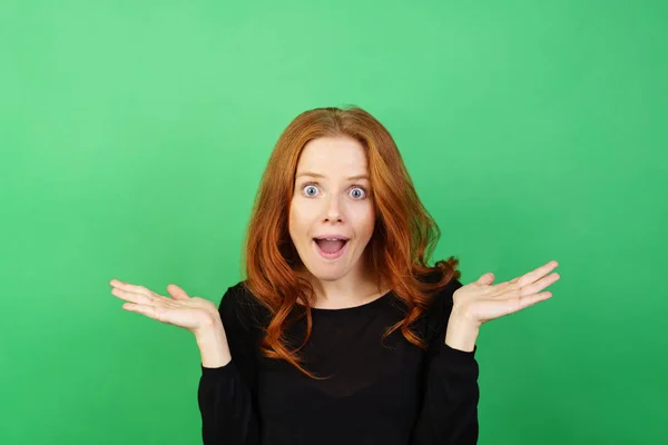 Exuberant young woman cheering Stock Photo by ©racorn 165199790