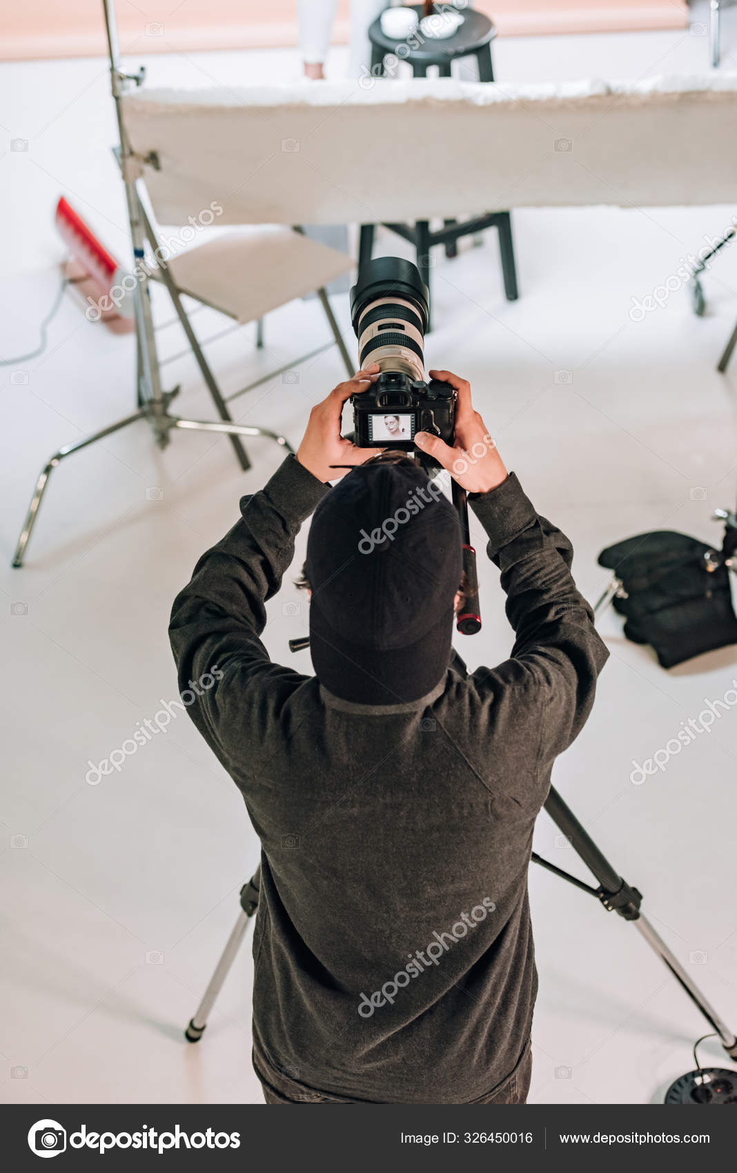 Overhead View Cameraman Looking Camera Display Photo Studio Stock Photo ...