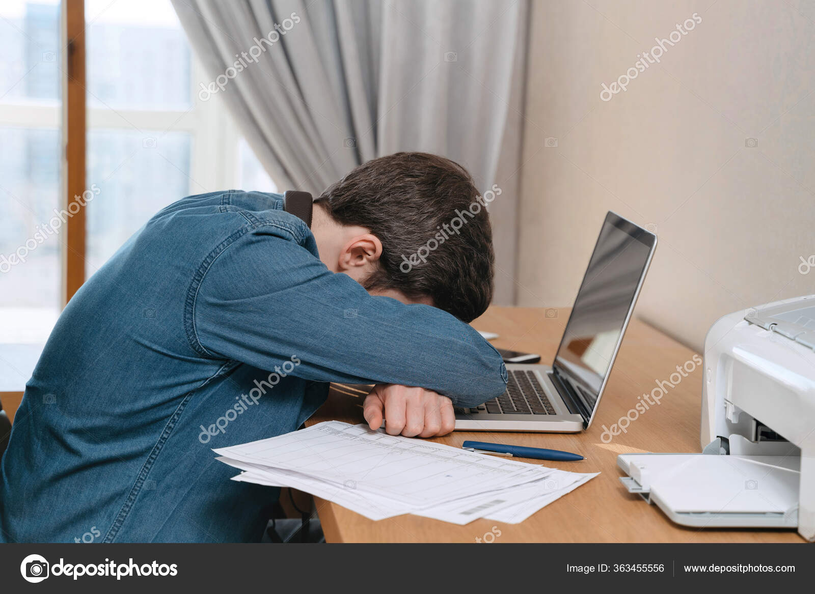 Man Crying At Computer