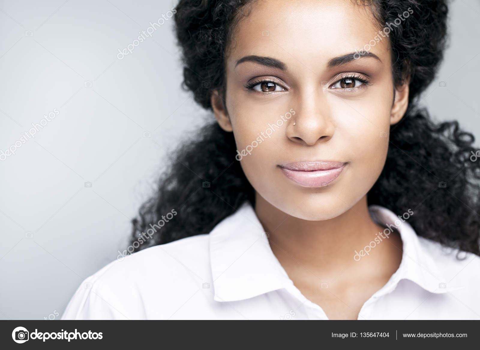 Smiling African Woman Stock Photo by ©luminastock 135647404