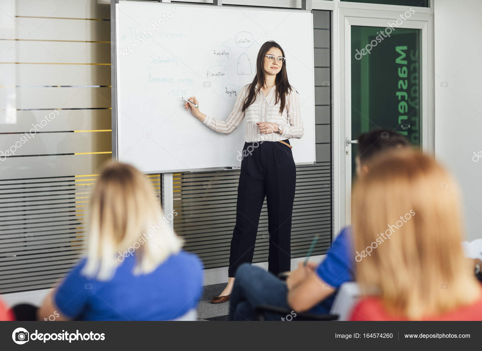 Teacher Giving a Lecture Stock Photo by ©luminastock 164574260