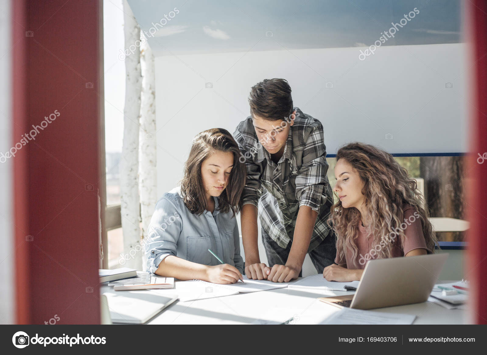 High School Students Teamworking Stock Photo by ©luminastock 169403706