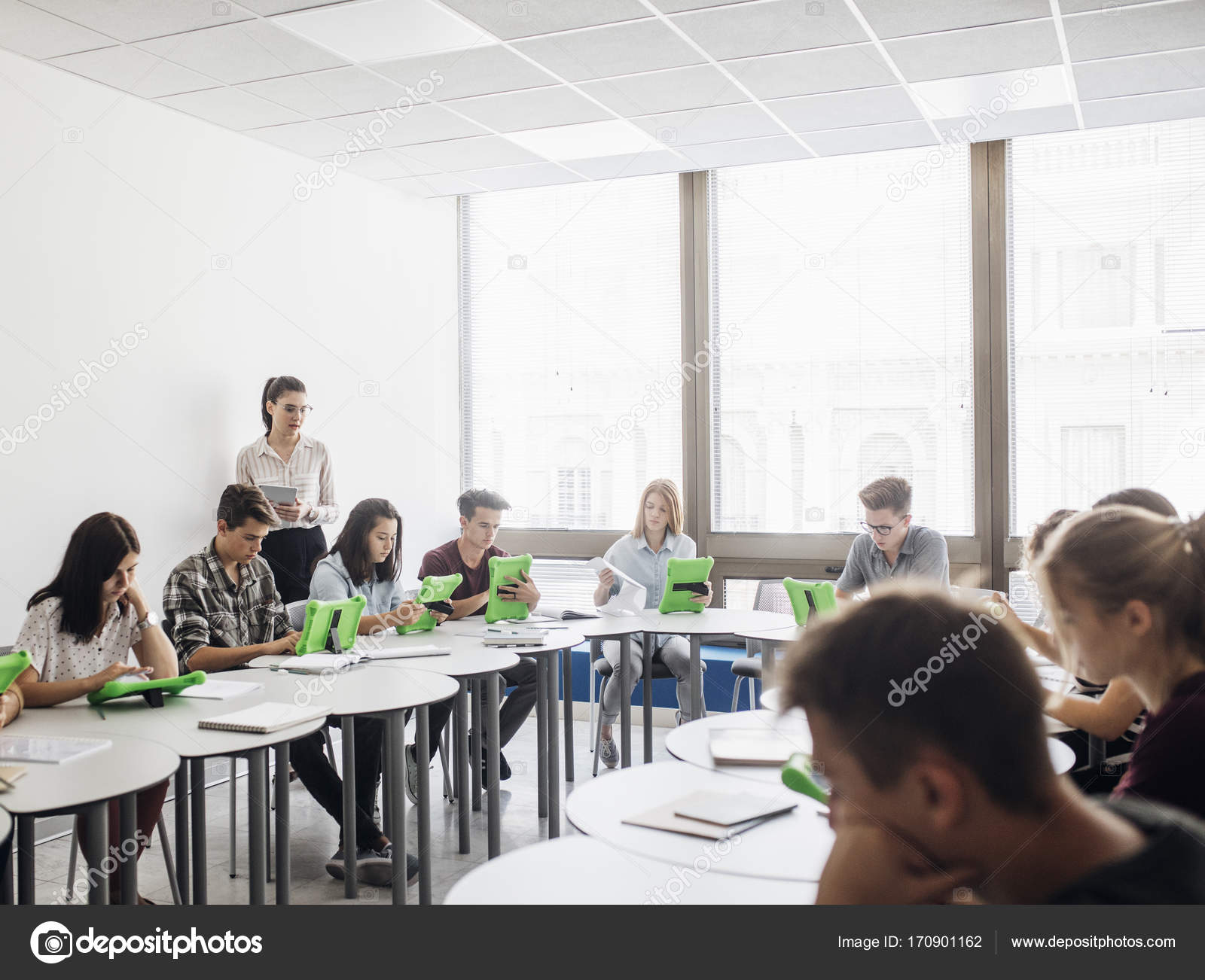 Students Studying at Modern Classroom — Stock Photo © luminastock ...