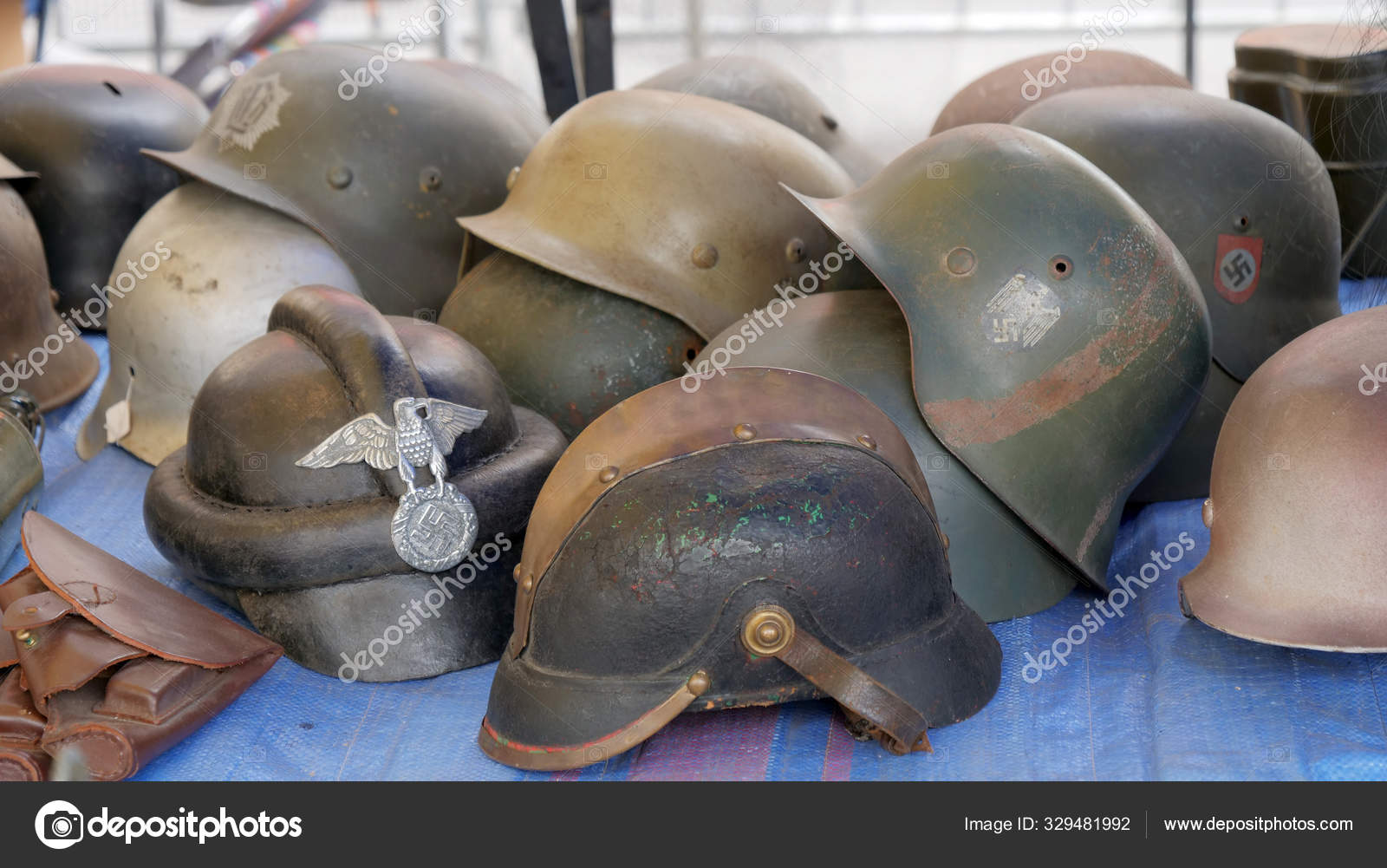 Collection of an old German military helmets for sale at the flea ...