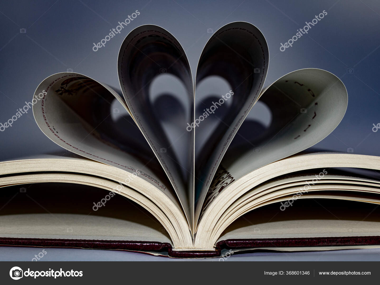 Open Book Creating Shapes Sheets — Stock Photo © Pablesku #368601346