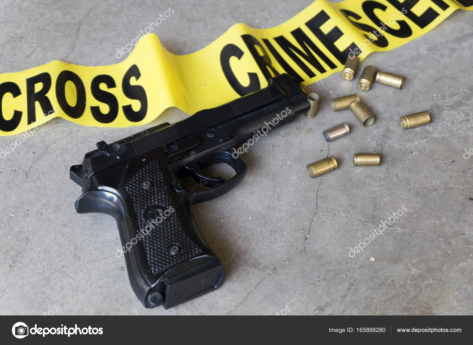 Crime scene concept with black gun and crime scene tape from above ...