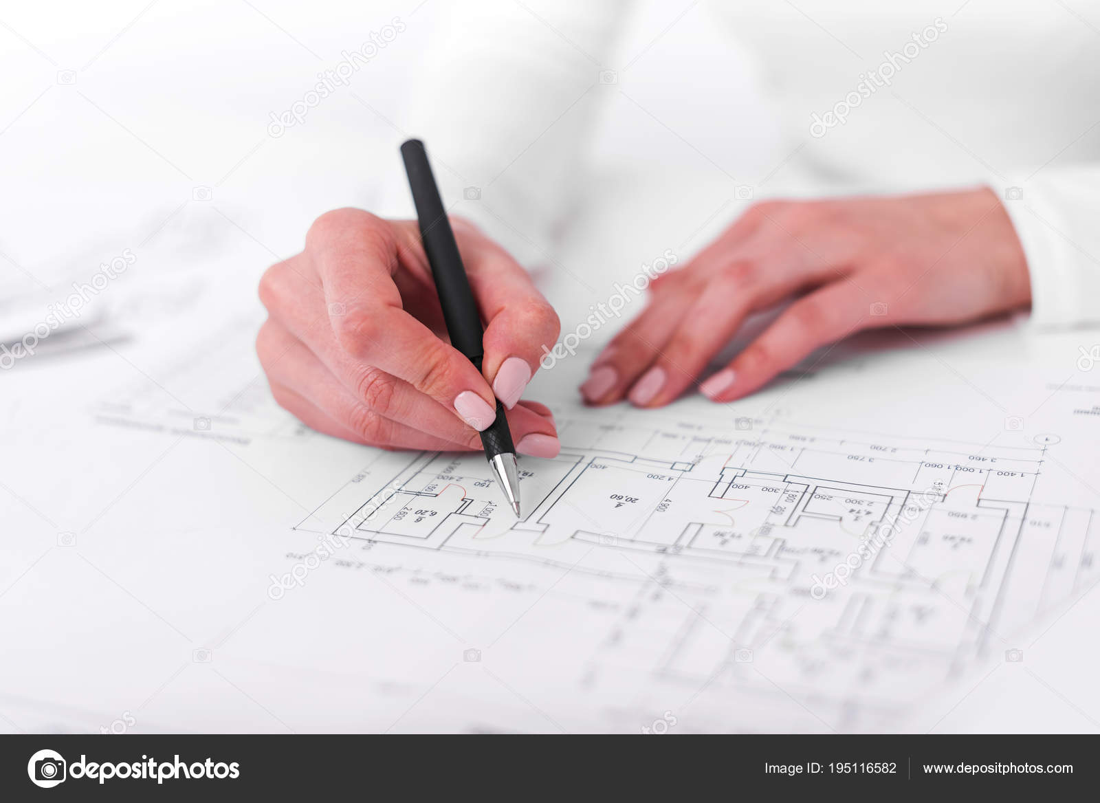 Engineer works with drawings. — Stock Photo © believeinme #195116582
