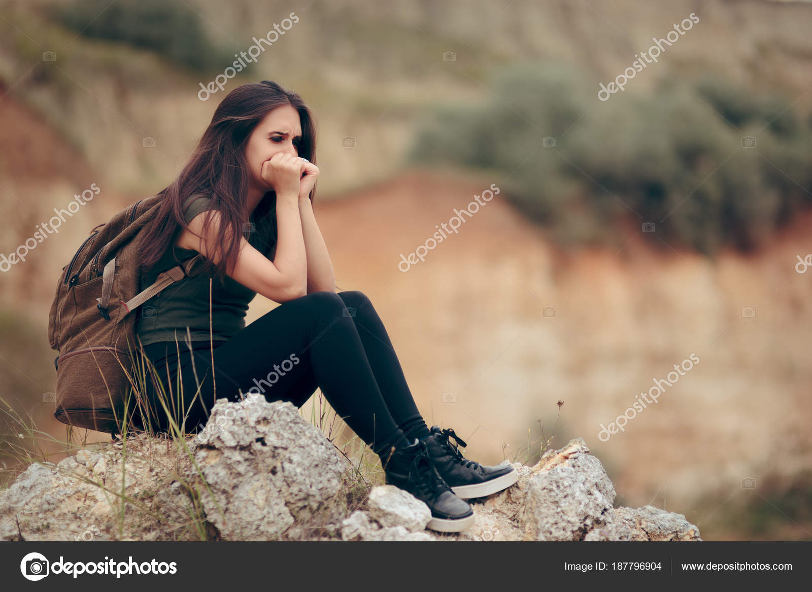 Sad Girl Standing On Cliff