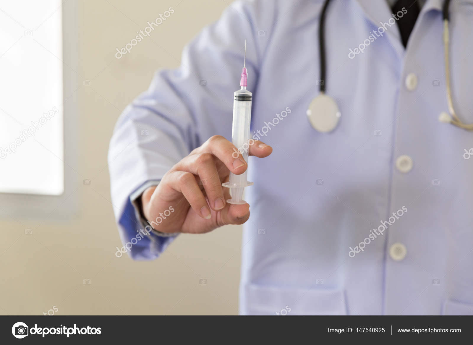 Doctor with syringe is preparing for medical injection ⬇ Stock Photo ...