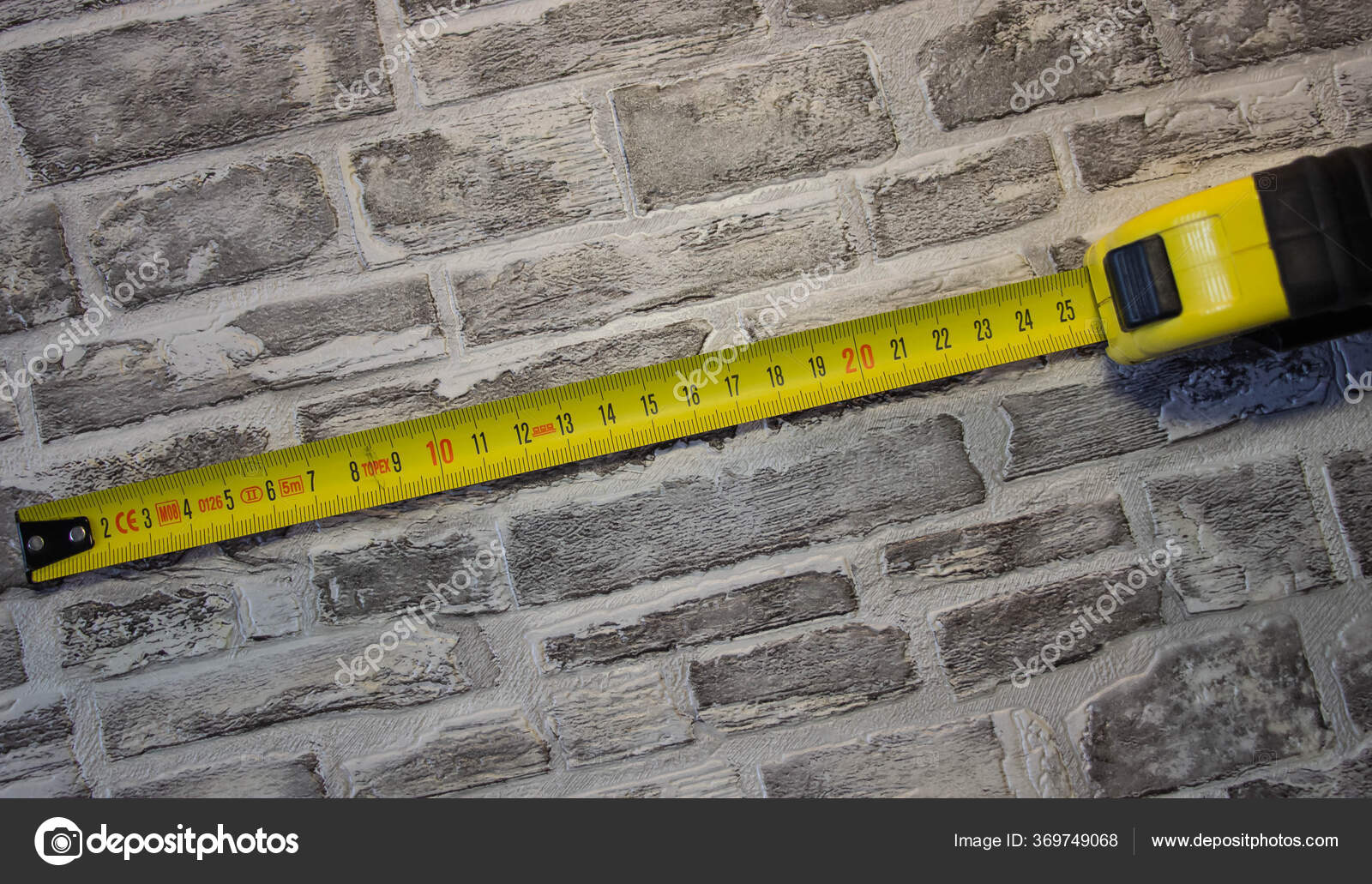 Yellow Construction Tape Measure Brick Backgroun — Stock Photo ...