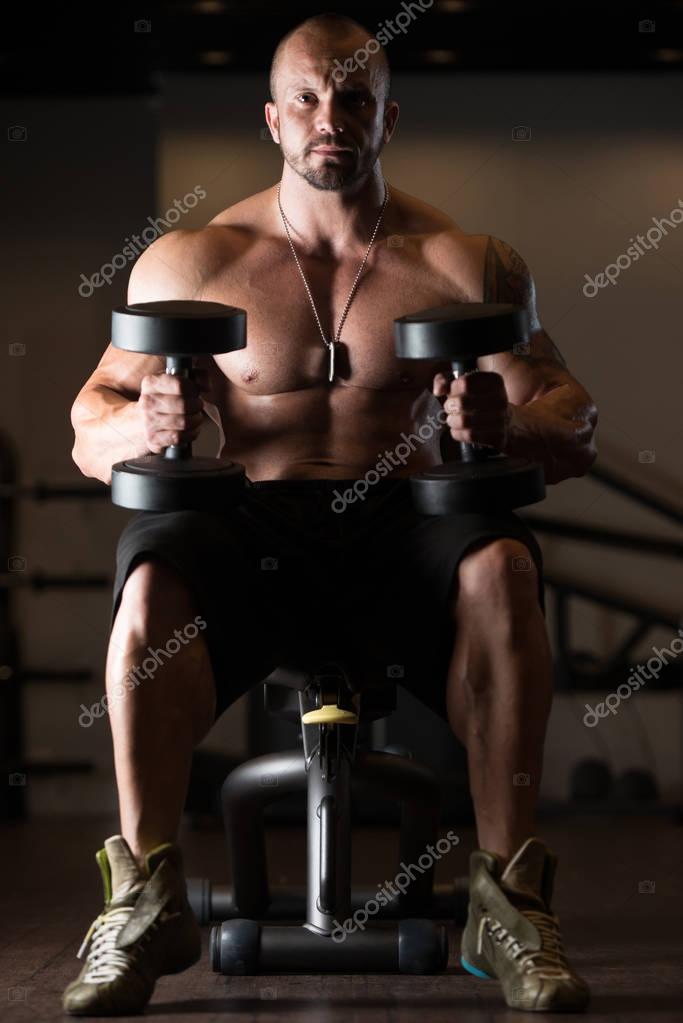 Bodybuilder Resting At The Bench Stock Photo by ©ibrak 129675932
