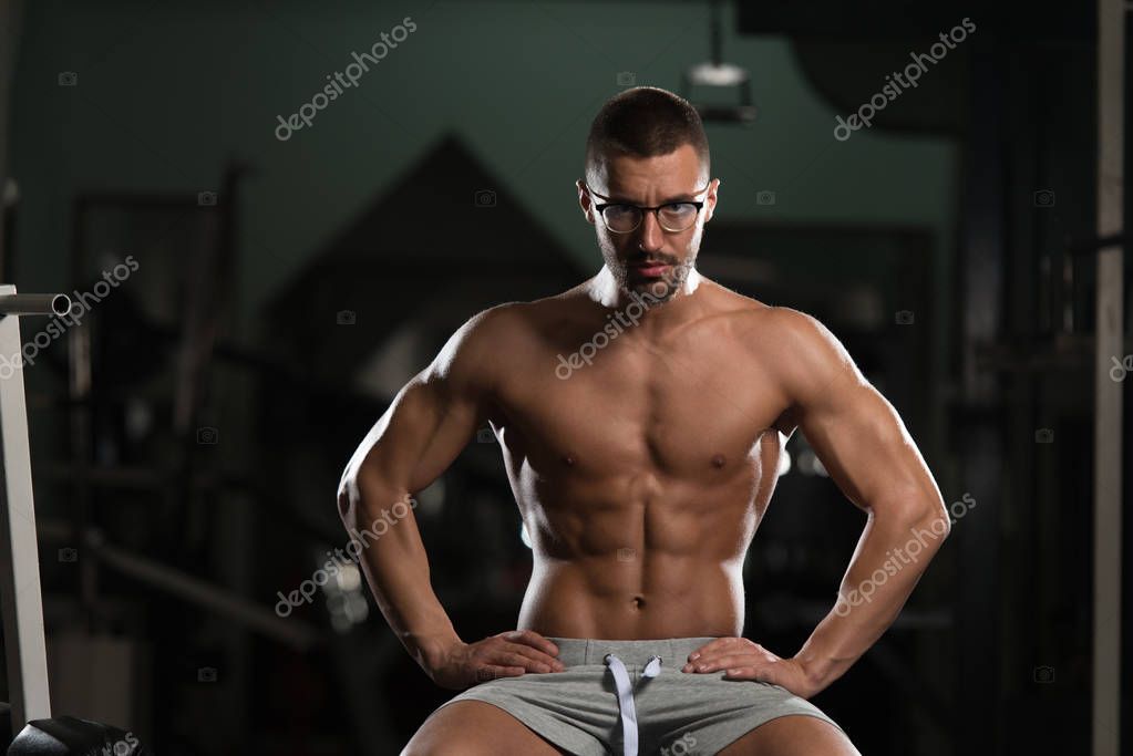 Nerd Man After Exercise Resting In Gym — Stock Photo © ibrak #132347252
