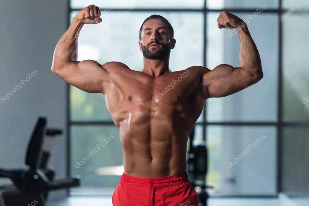 Bodybuilder Fitness Model Posing Double Biceps After Exercises — Stock ...