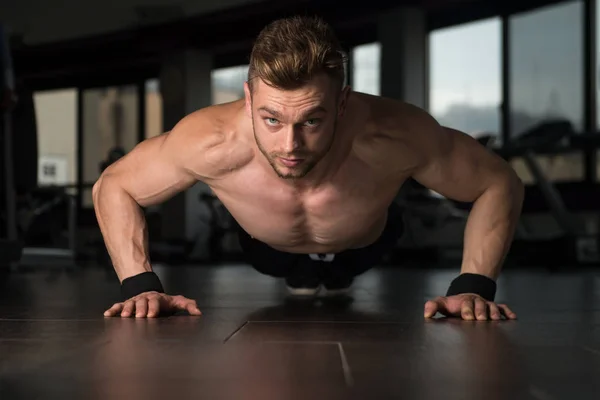 Young Man Exercising Push Ups - Stock Image - Everypixel