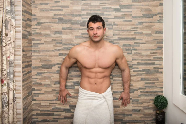 Good Looking Man In Towel Poses Stock Photo by ©ibrak 159310320