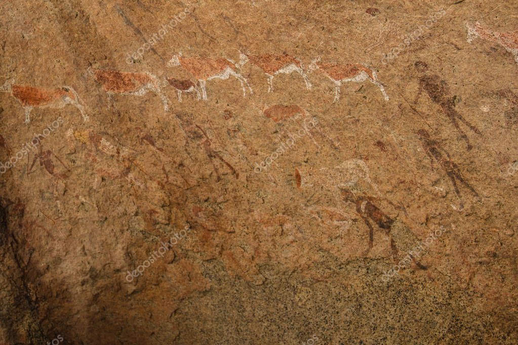 Antiguas pinturas rupestres Montañas africanas ion un fondo beige 2022