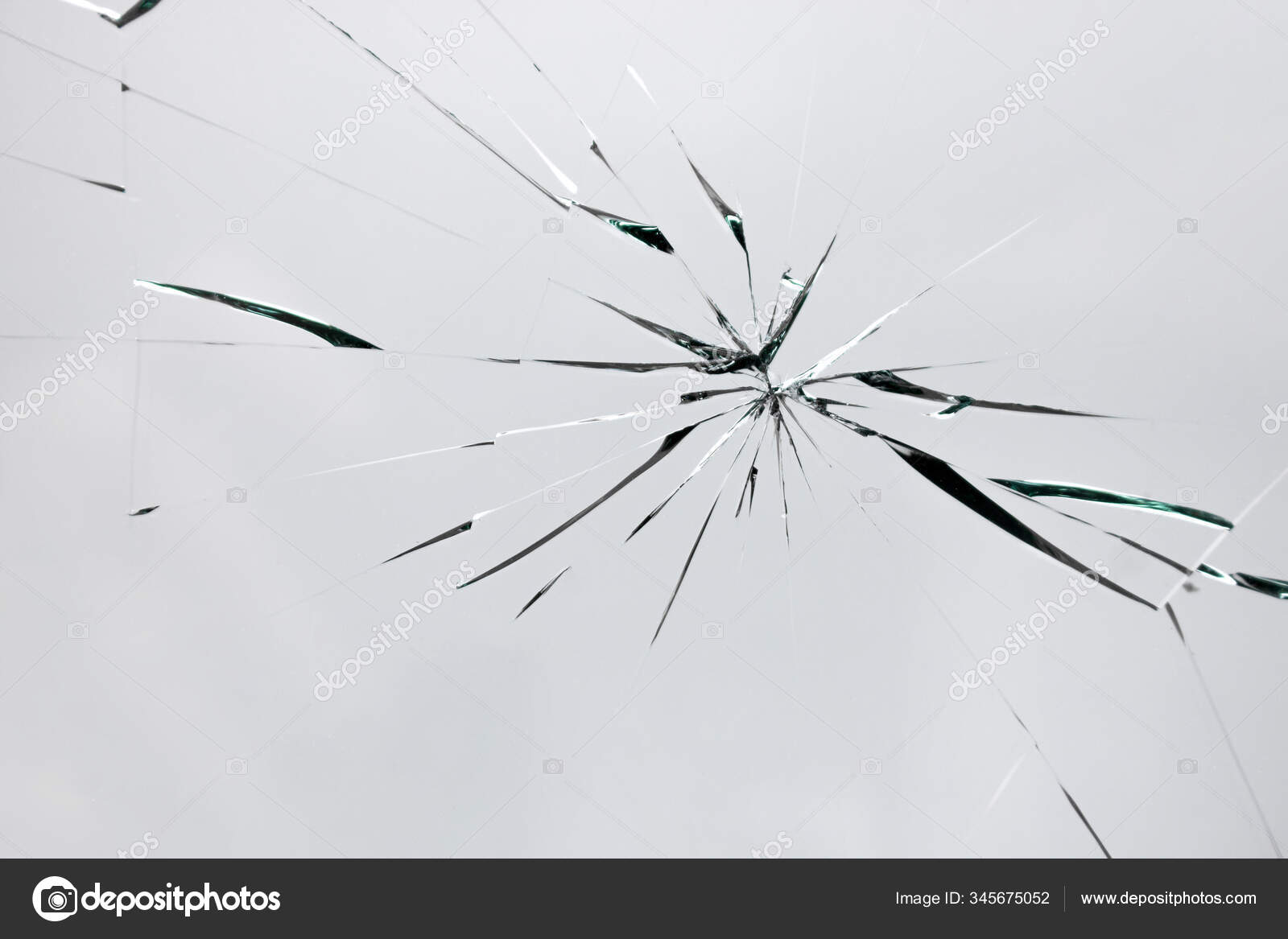 Cracks on broken glass from impact, white crack line fountain on window ...