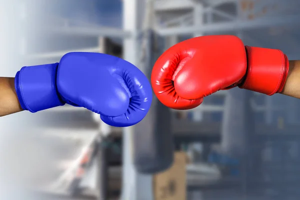 Red and Blue boxing gloves in Gym Fitness - Stock Image - Everypixel