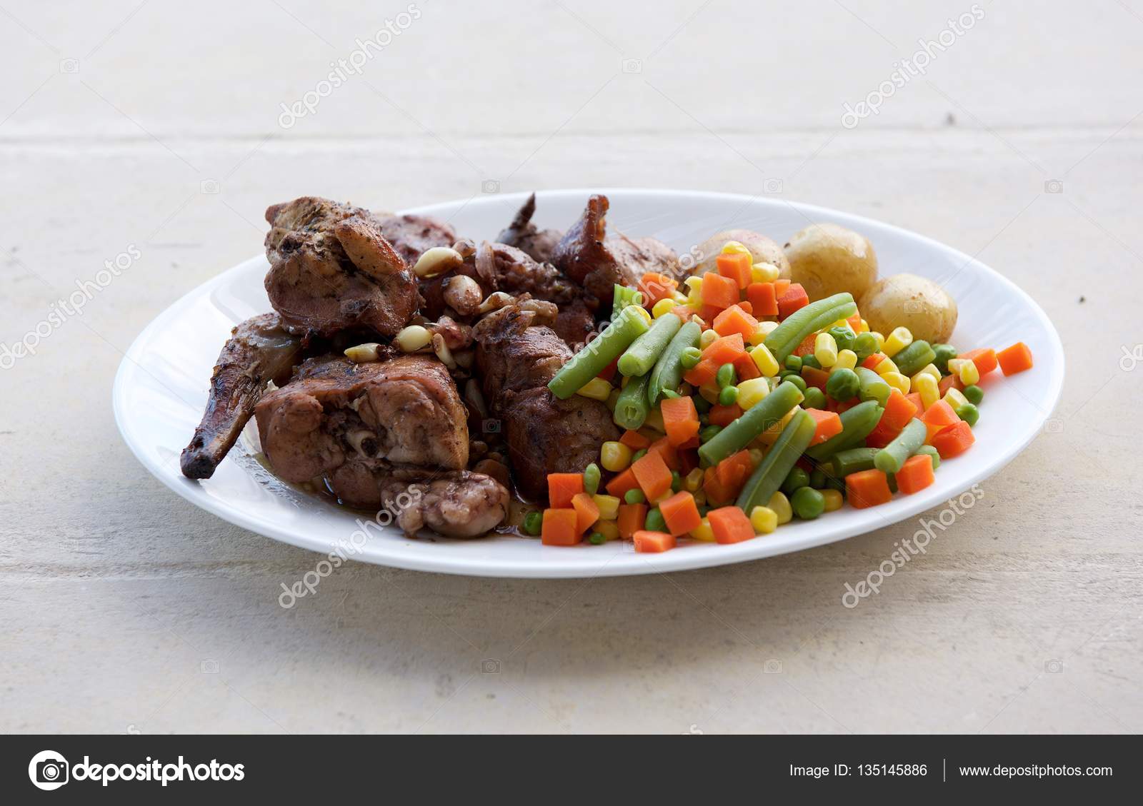 Traditional maltese food - cooked rabbit with vegetables. Maltese ...