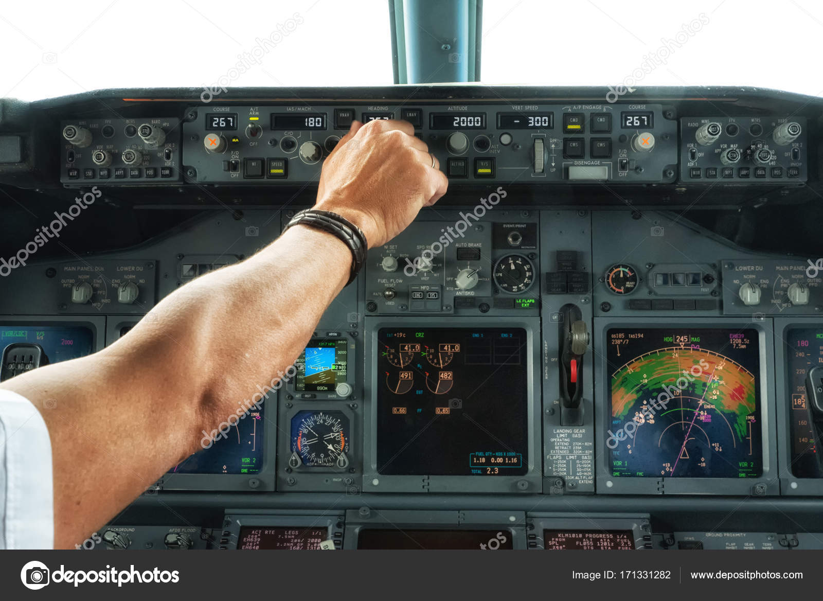 Pilot hand operate a switch on aircraft panels. — Stock Photo © atosan ...