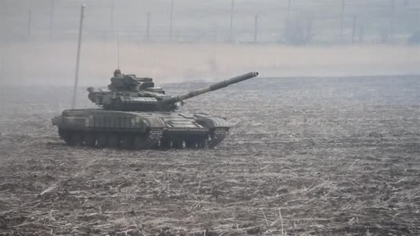 Tank exercises at the training ground. Shots of tanks in motion ...