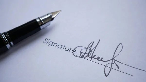 A signature is required Stock Photos, Royalty Free A signature is ...
