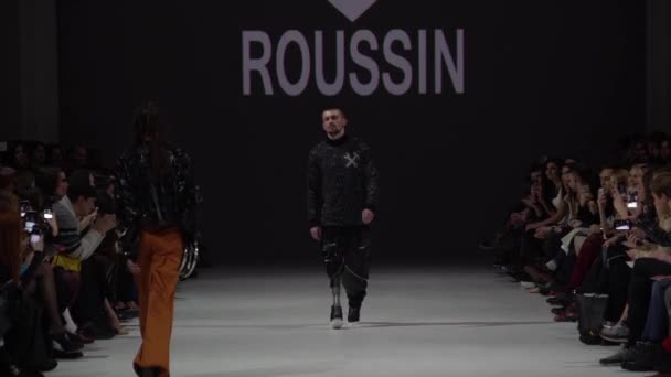 Fashion show. Male man model walks on the catwalk. Stock Video Footage ...