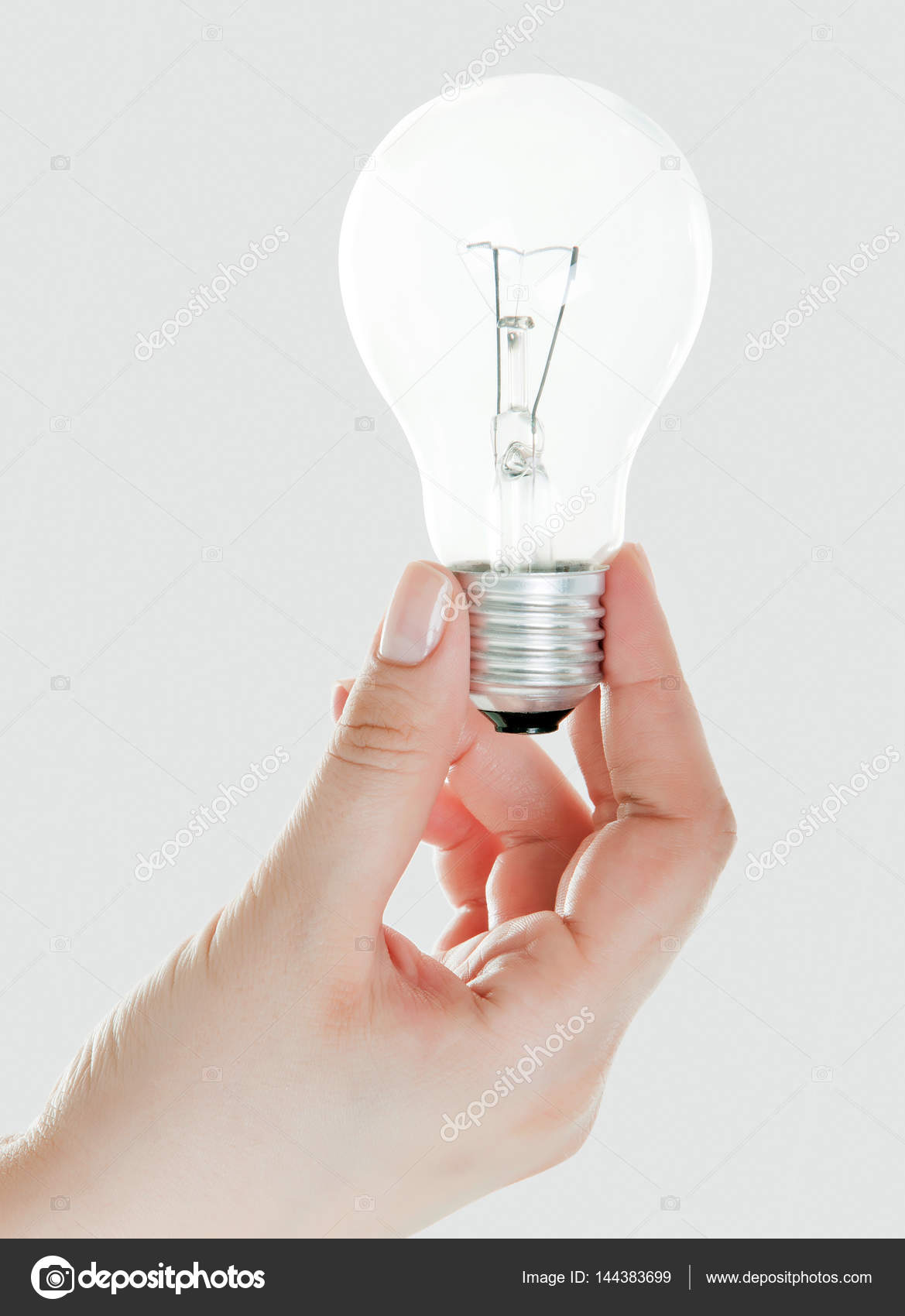 Light bulb (lamp) in hand Isolated on white background — Stock Photo ...