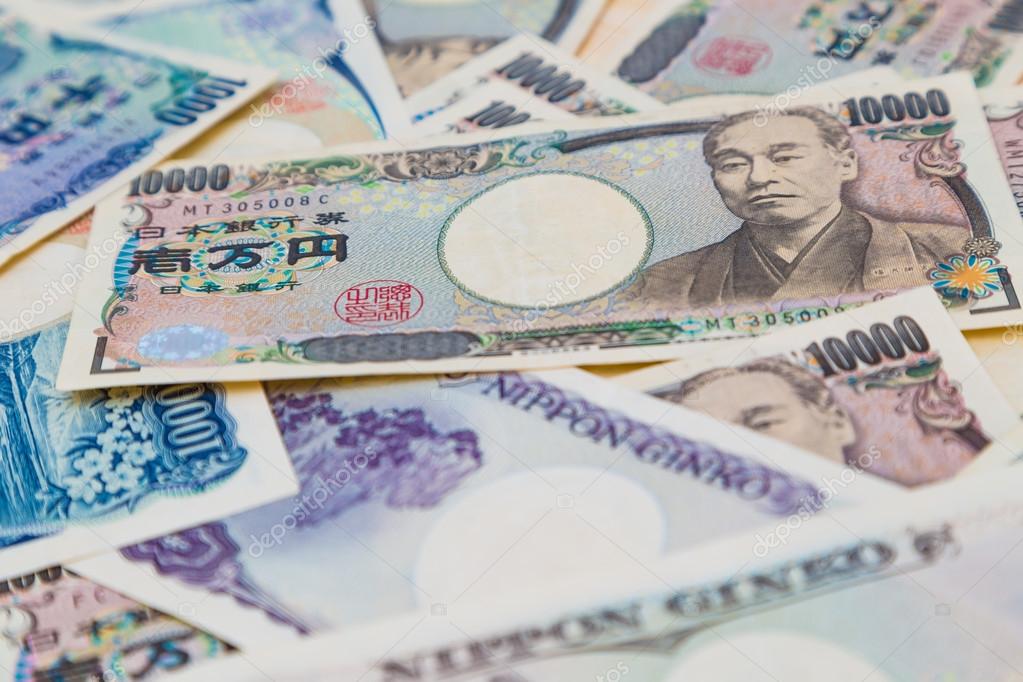 BAckground of Japanese currency notes — Stock Photo © benedixs #128653878