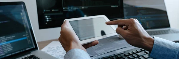 Programmer working On Computer In IT Office Typing Data Coding i ...