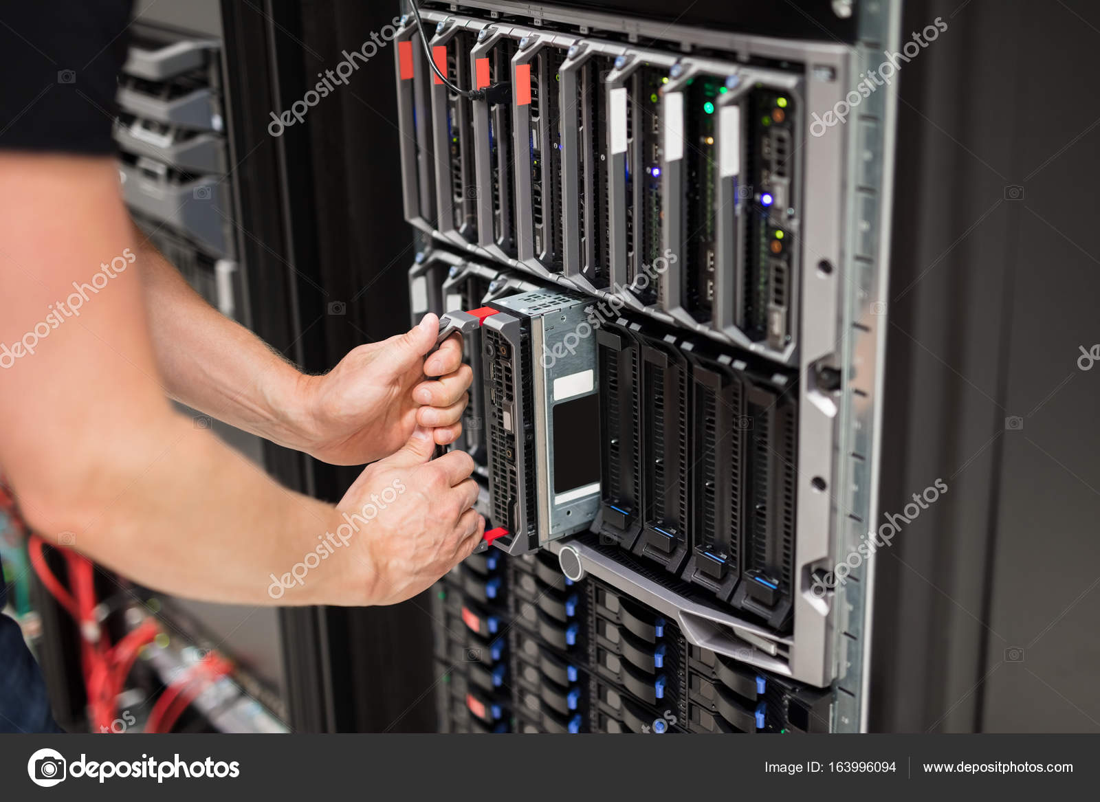 Computer Engineer Installing Blade Server In Data Center Stock Photo by ...