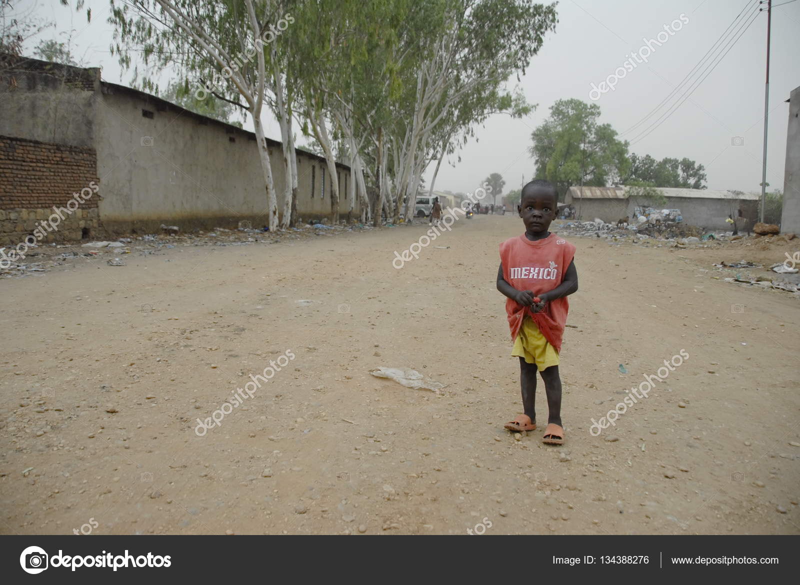 Small boy walks on a street of Juba, South Sudan. – Stock Editorial ...