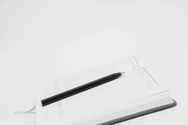 Cuadernos y lapiz fotos de stock, imágenes de Cuadernos y lapiz sin royalties | Depositphotos