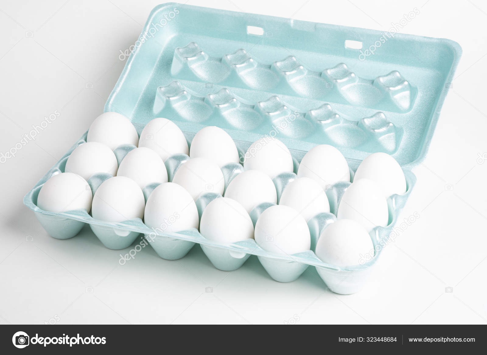 A Tray Of White Eggs — Stock Photo © dominiquejames #323448684