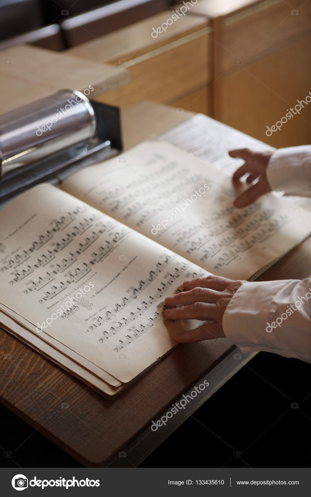 Music teacher with music notes Stock Photo by ©MicrostockAsia 133435610