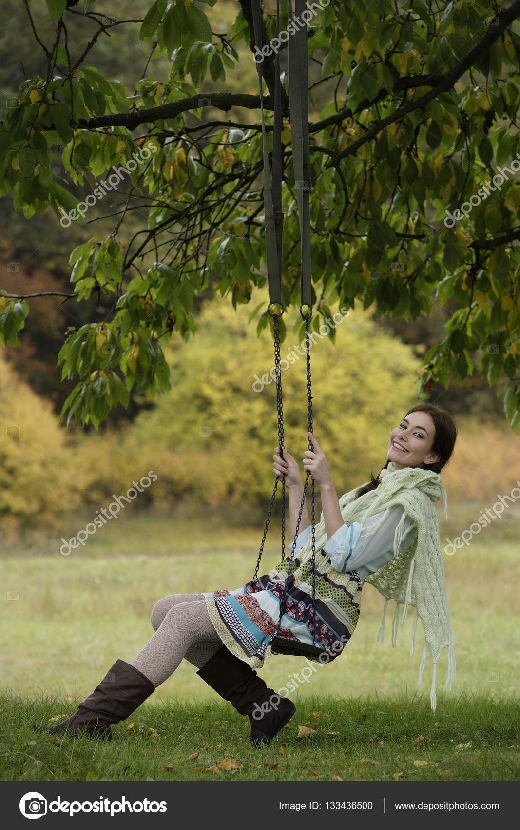 Woman in tree swing Stock Photo by ©MicrostockAsia 133436500
