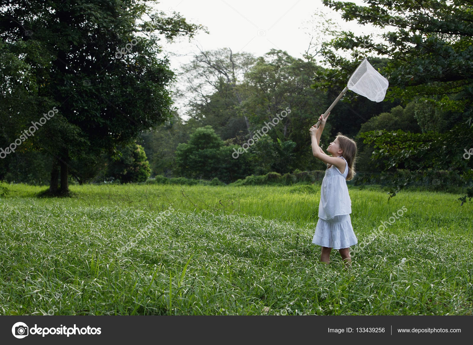 Girl Chasing Butterfly