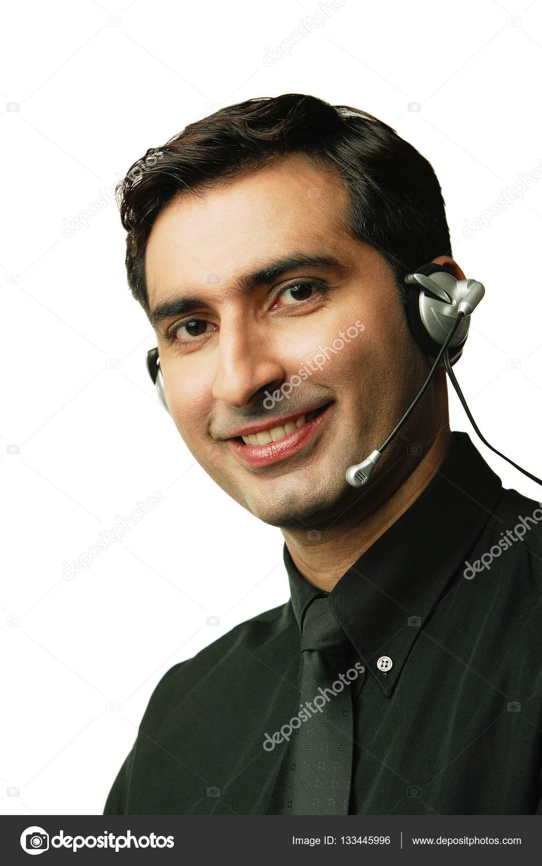 Man using headset, smiling Stock Photo by ©MicrostockAsia 133445996