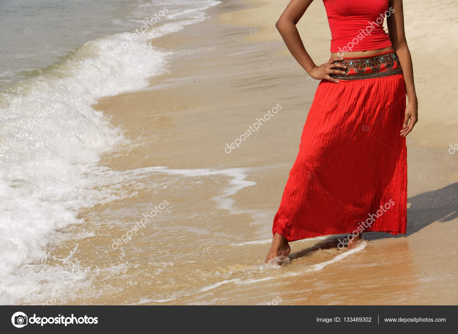 Woman on sandy beach — Stock Photo © MicrostockAsia #133469302