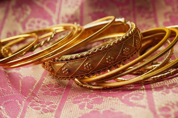 Old gold bangles Stock Photos, Royalty Free Old gold bangles Images ...