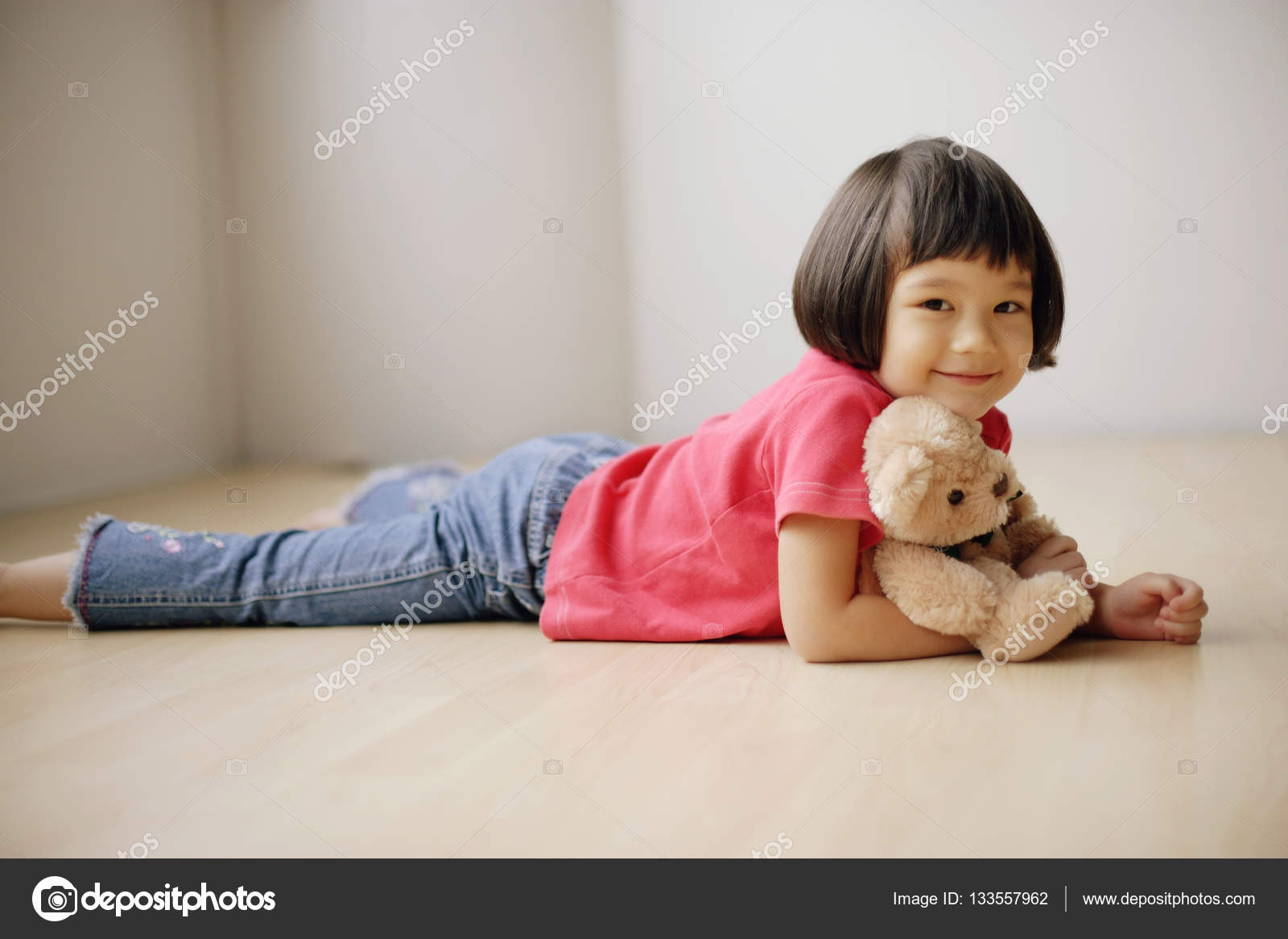 Young girl lying on front Stock Photo by ©MicrostockAsia 133557962