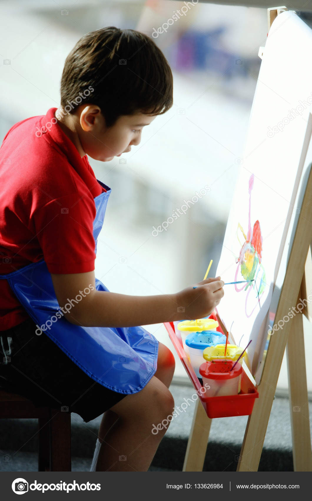 Boy holding colour pencil Stock Photo by ©MicrostockAsia 133626984
