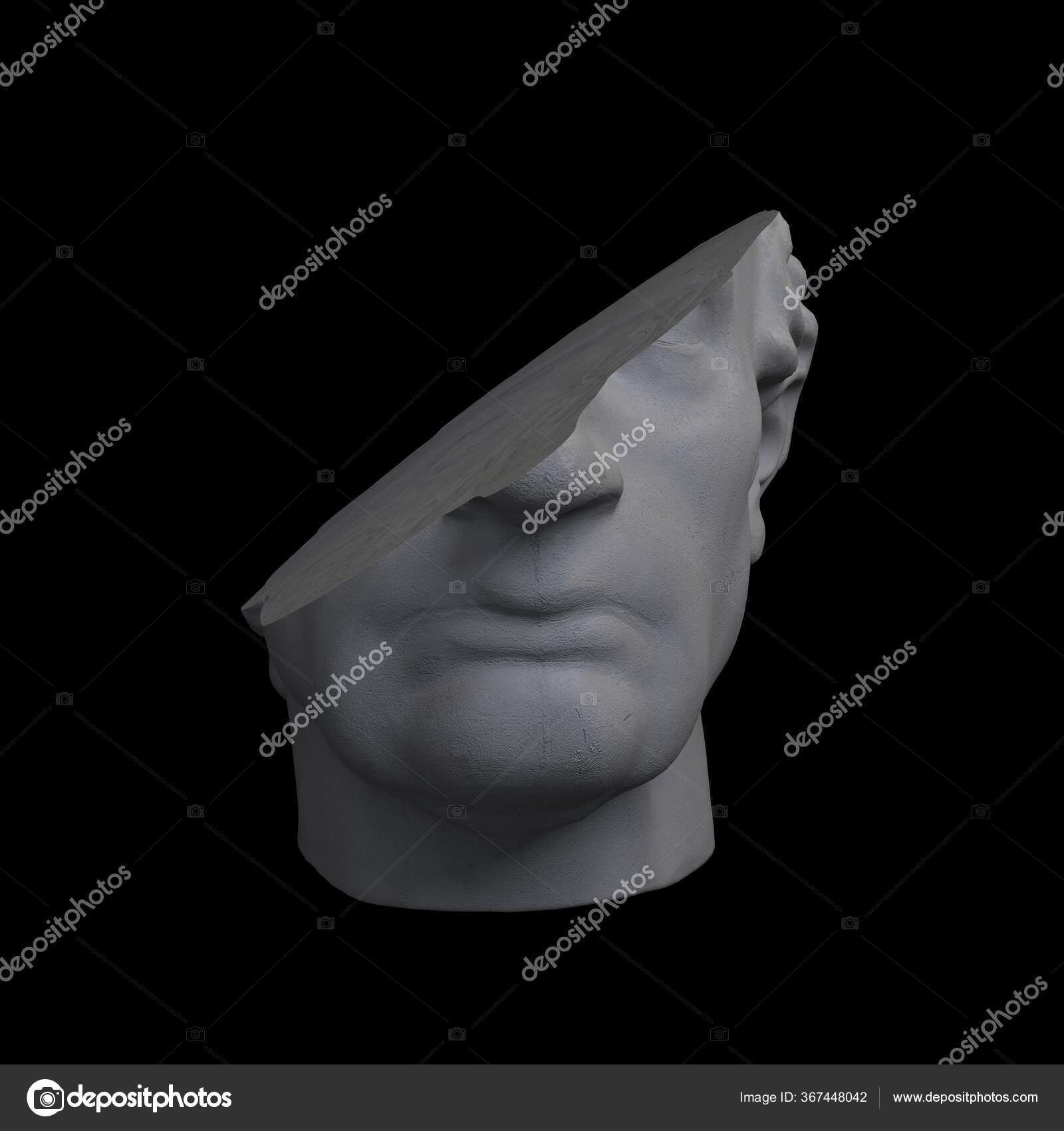 Fragment of colossal head sculpture of classical style in monochromatic ...